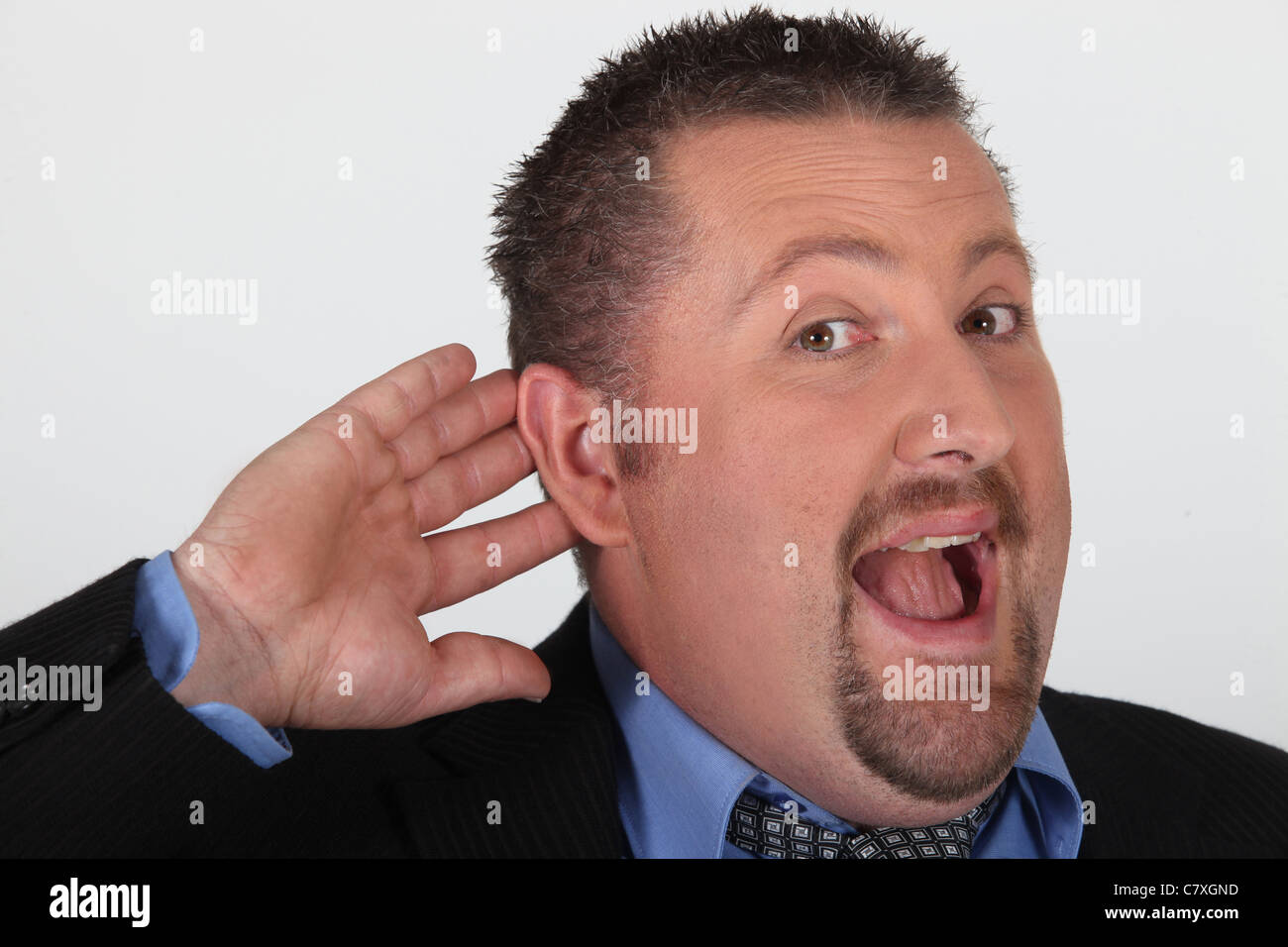 Businessman listen gesture hand ear hi-res stock photography and images ...