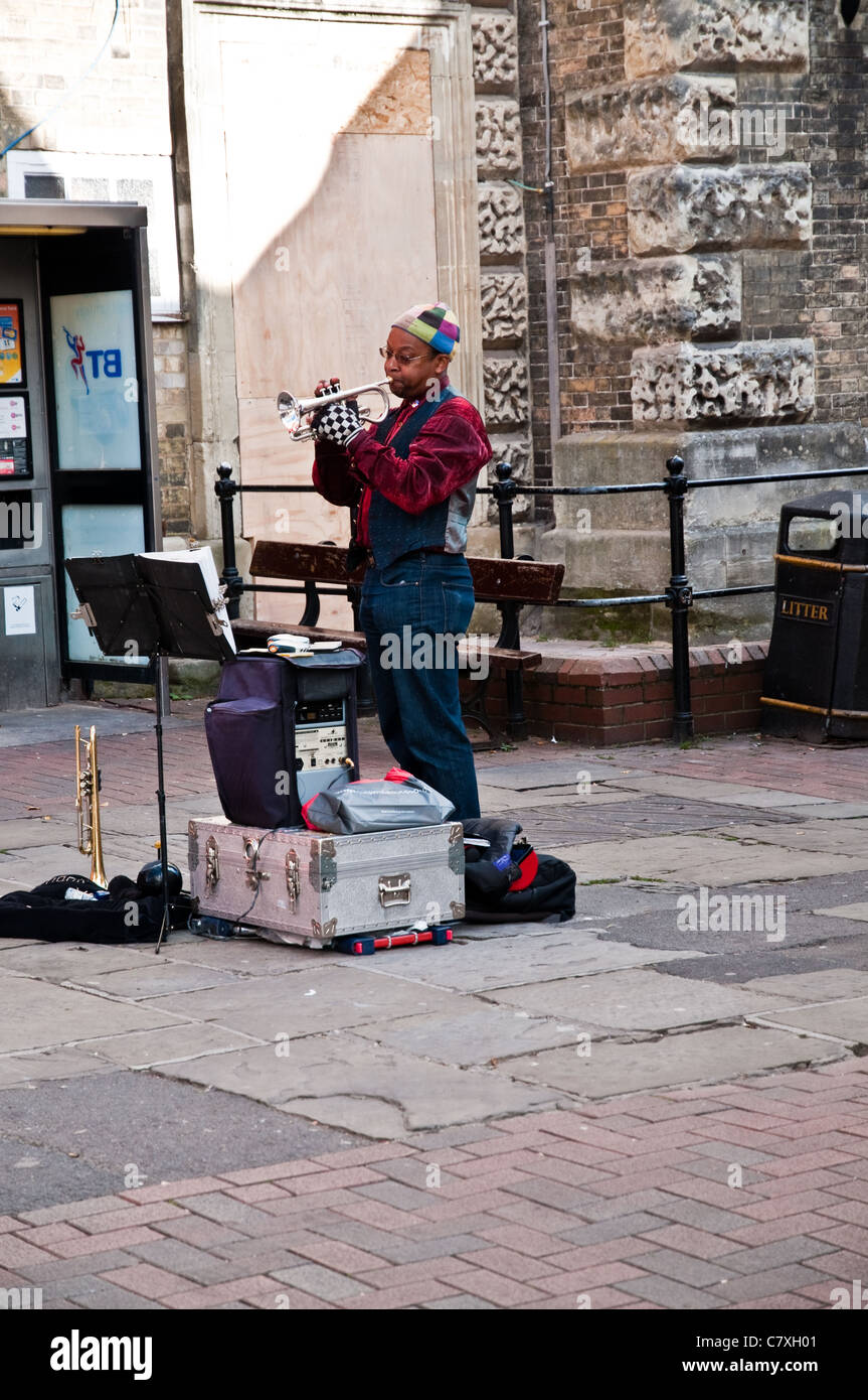A street musician playing the trumpet Stock Photo - Alamy