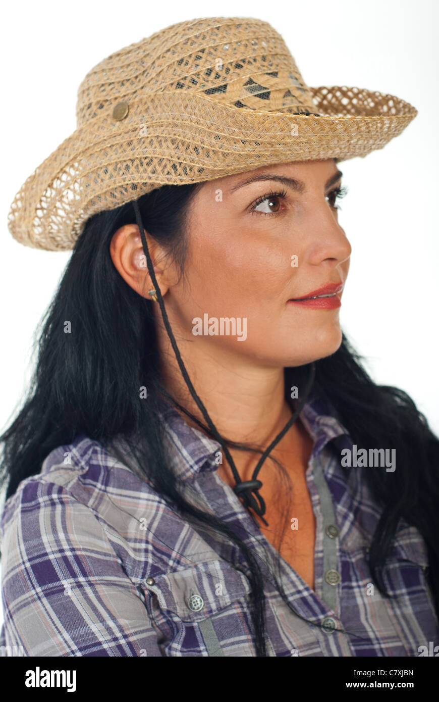 Profile of woman with cowboy hat looking away isolated on white ...
