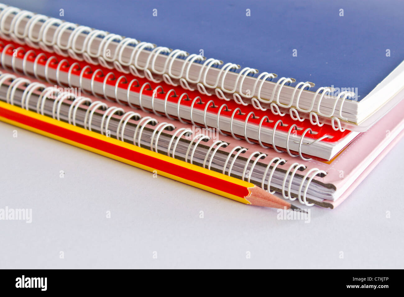 Three notebook Cove blue red and pink on white color background Stock ...