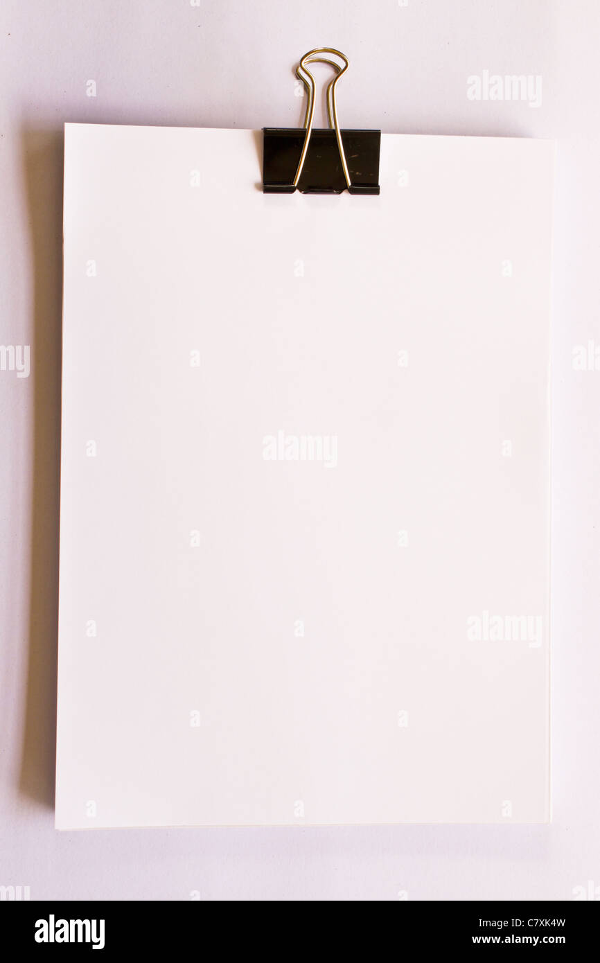 White blank paper clipper on white background Stock Photo - Alamy