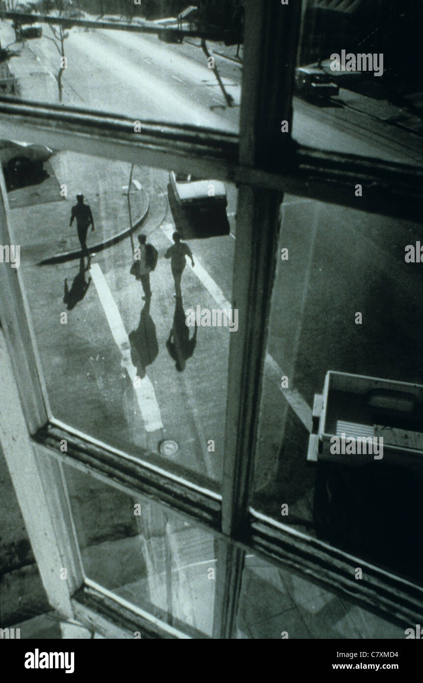 men walking seen through window Stock Photo - Alamy