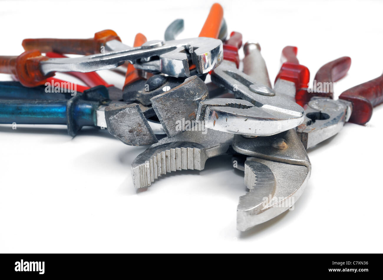 Group of various pliers on white background Stock Photo - Alamy