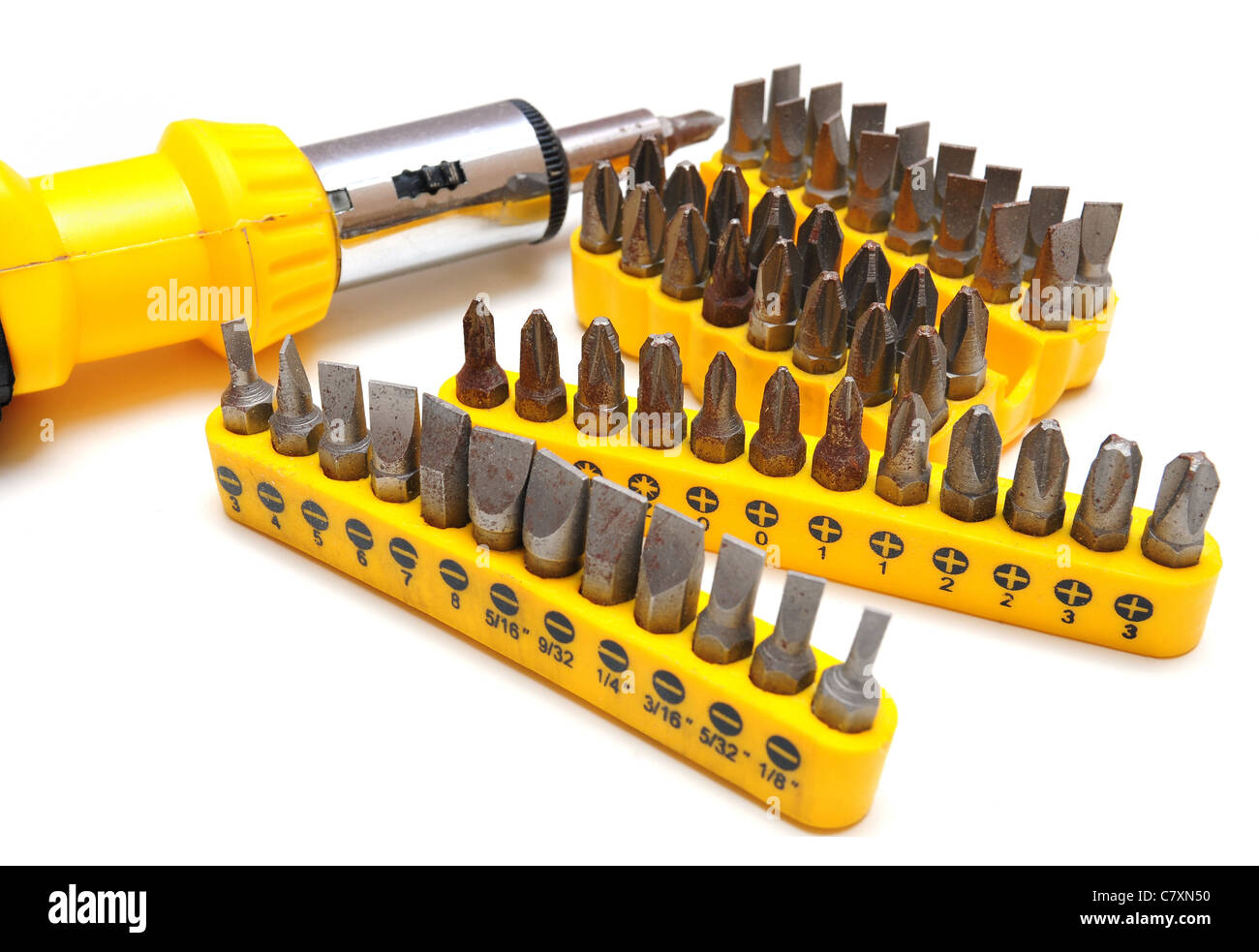 Screwdriver and bits on white background Stock Photo - Alamy