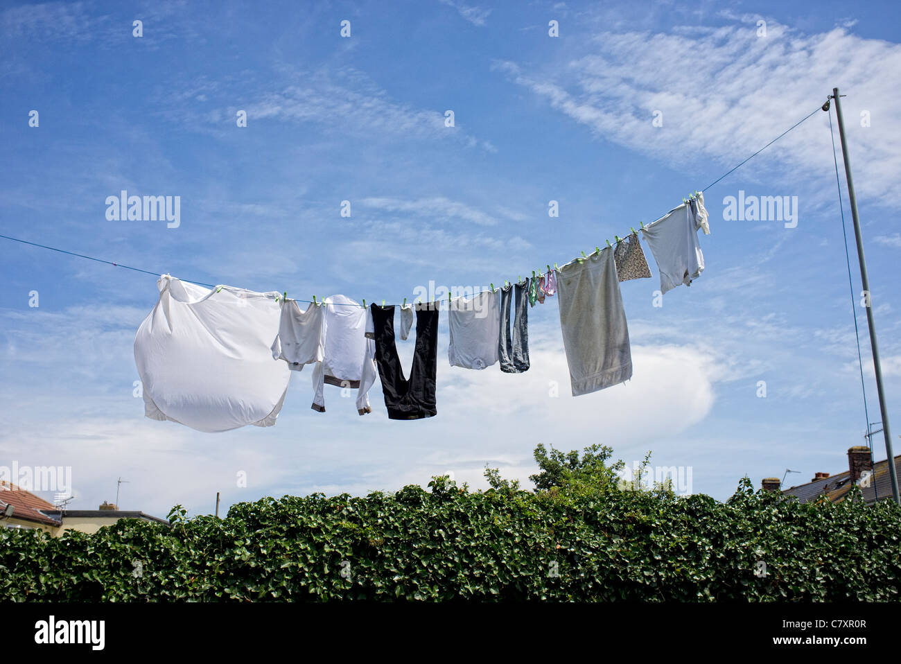 washing drying on a washing line Stock Photo - Alamy