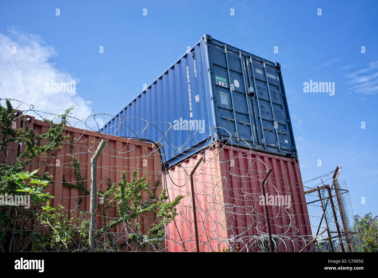 Shipping containers stacked used for storage Stock Photo - Alamy