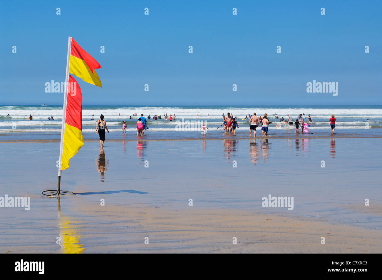 RNLI safe swimming flag on Westward Ho! beach on the North Devon coast ...