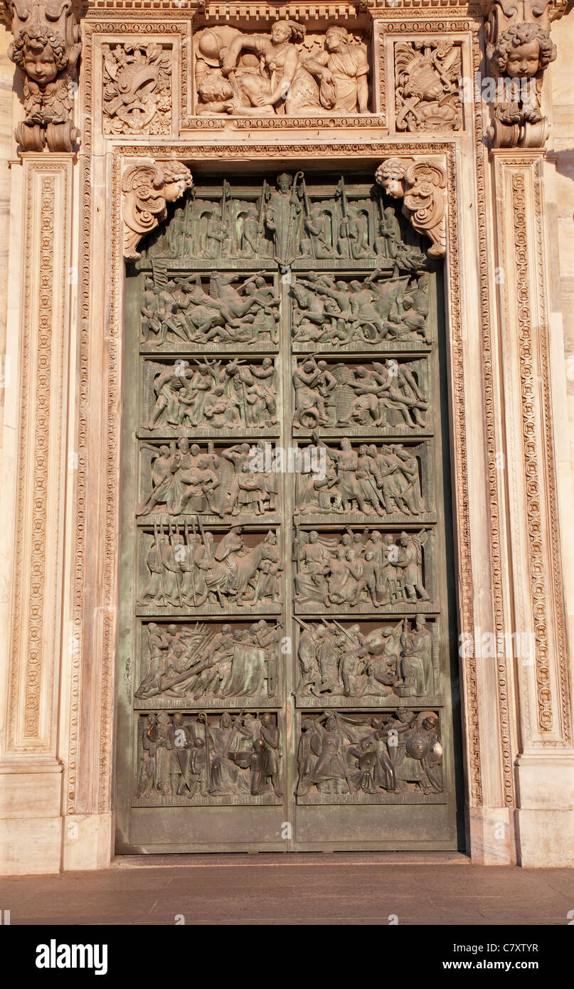 Milan - side bronze gate of Duomo cathedral Stock Photo - Alamy