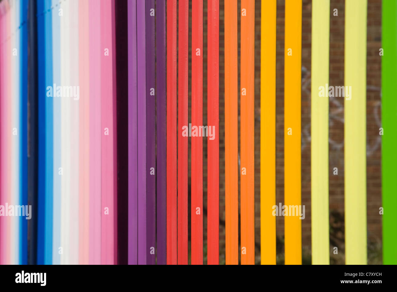 Multi coloured metal fence Stock Photo - Alamy