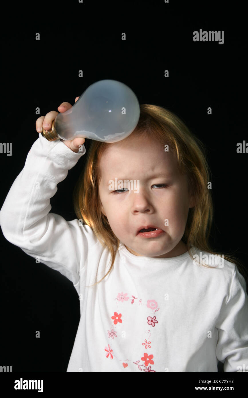 Small girl and her large crazy idea Stock Photo - Alamy