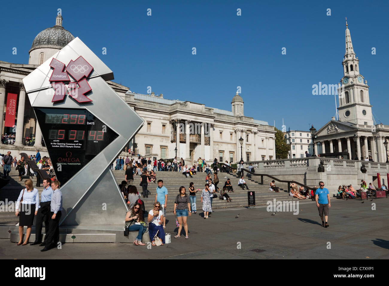 Olympic countdown clock in Trafalgar Square with tourists, London ...