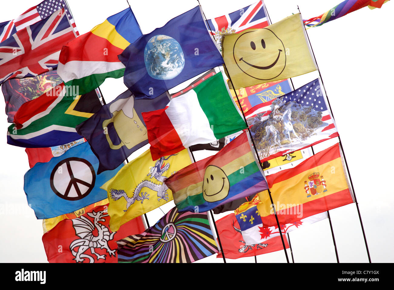 Variety of flags flying in breeze Stock Photo - Alamy