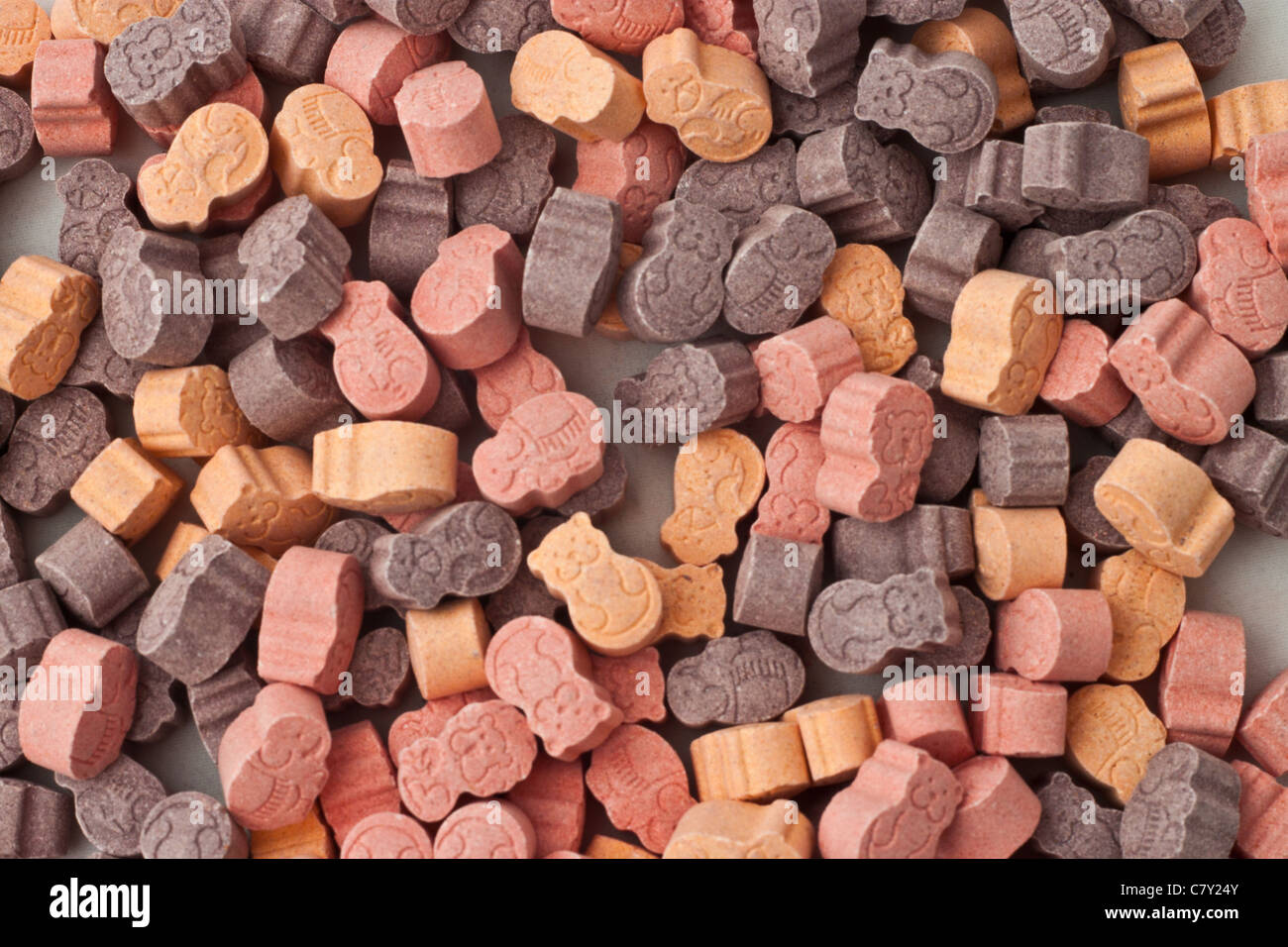 Assortment of animal vitamins filling the screen Stock Photo - Alamy