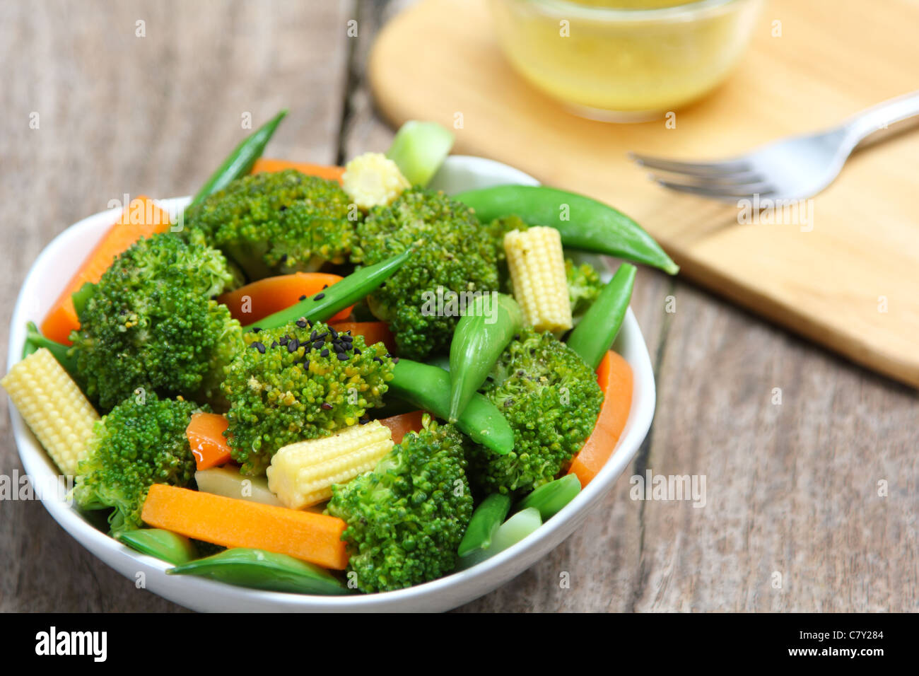 Broccoli salad with carrot ,baby corn and snap pea Stock Photo - Alamy