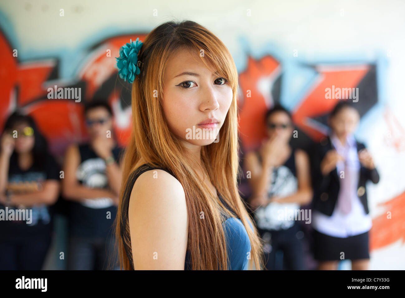 Influential women and her gang in a graffiti painted Stock Photo - Alamy