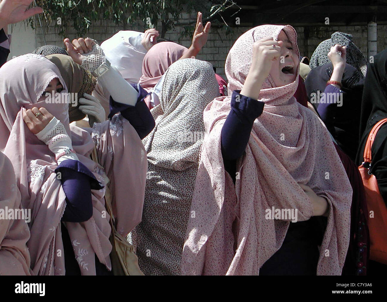 Veiled students are protesting against killing of innocent people in ...