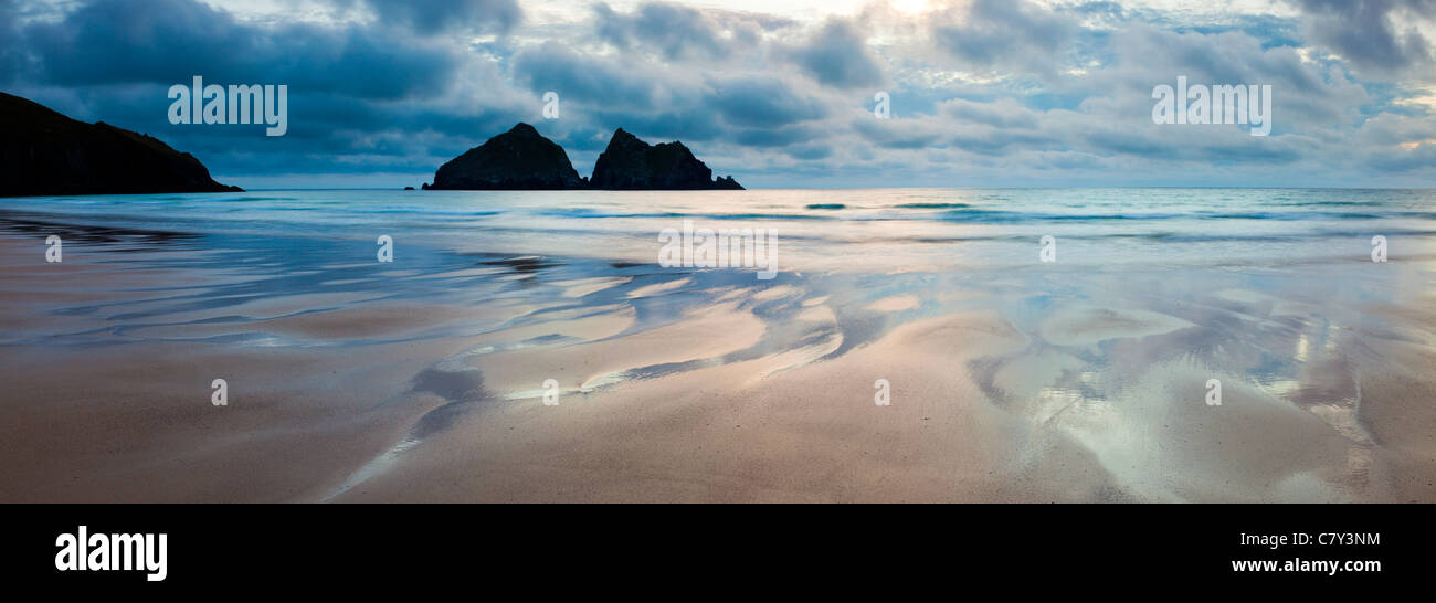 Moody sunset on the beach at Holywell Bay Cornwall England with Carters ...
