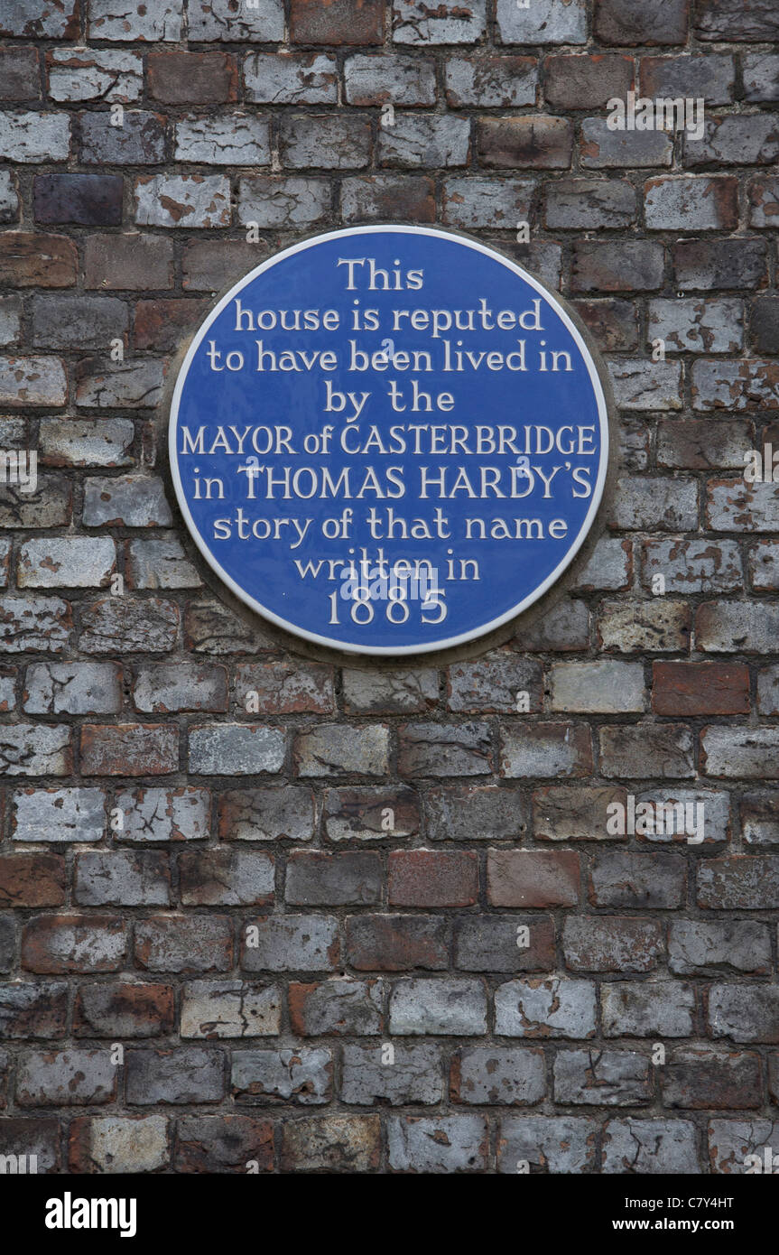 A blue ceramic plaque indicates the fictional home of Michael Henchard ...