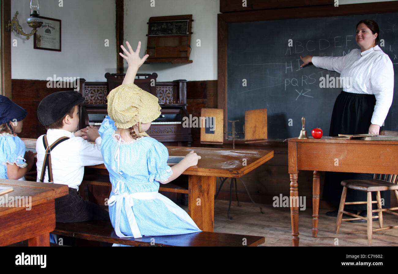 Children old school house room learning from a teacher Stock Photo - Alamy