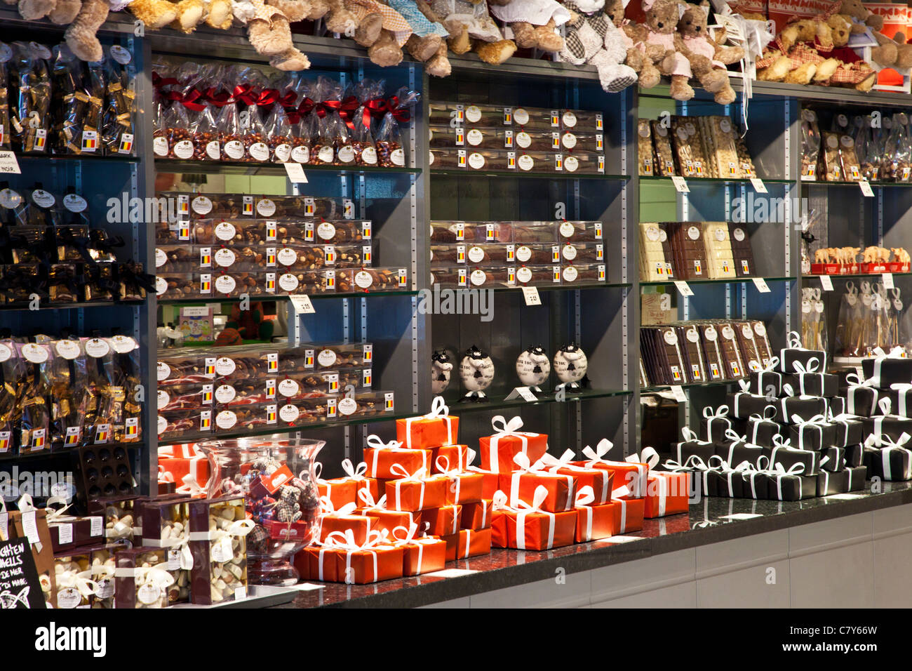 Gift boxes, packages and parcels of Belgian chocolates on display ...