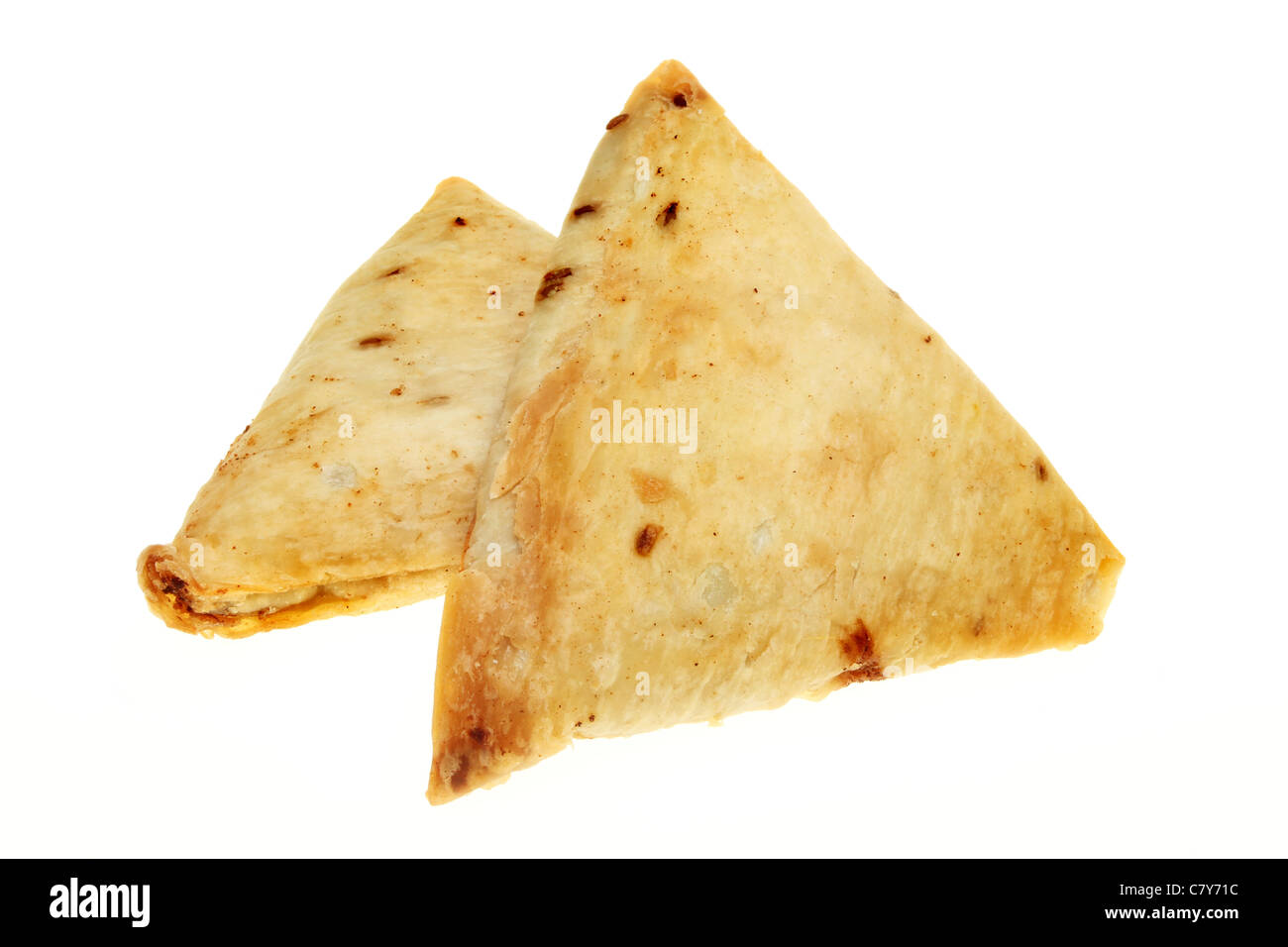 Two Indian samosa snacks isolated against white Stock Photo - Alamy