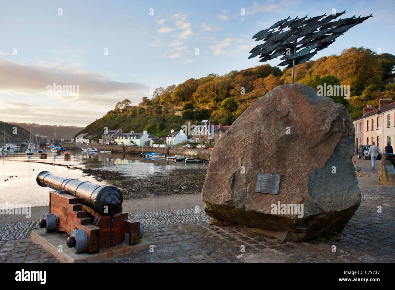The old port of Fishguard, Pembrokeshire, with herring sculpture Stock ...
