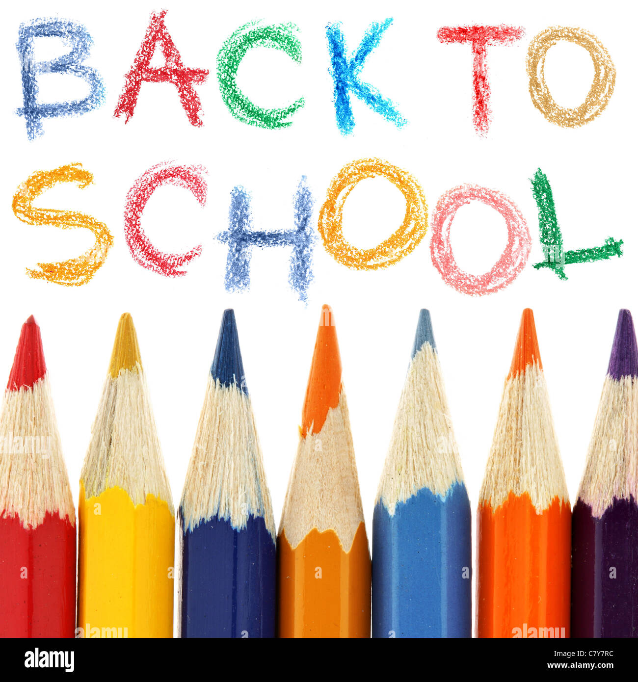 Crayons and back to school text over white background Stock Photo - Alamy