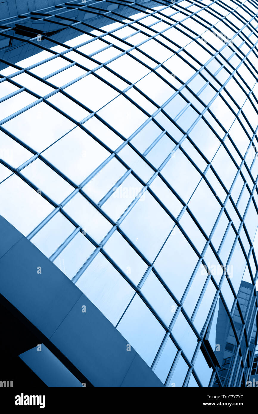 Windows of modern building toned in blue color Stock Photo - Alamy