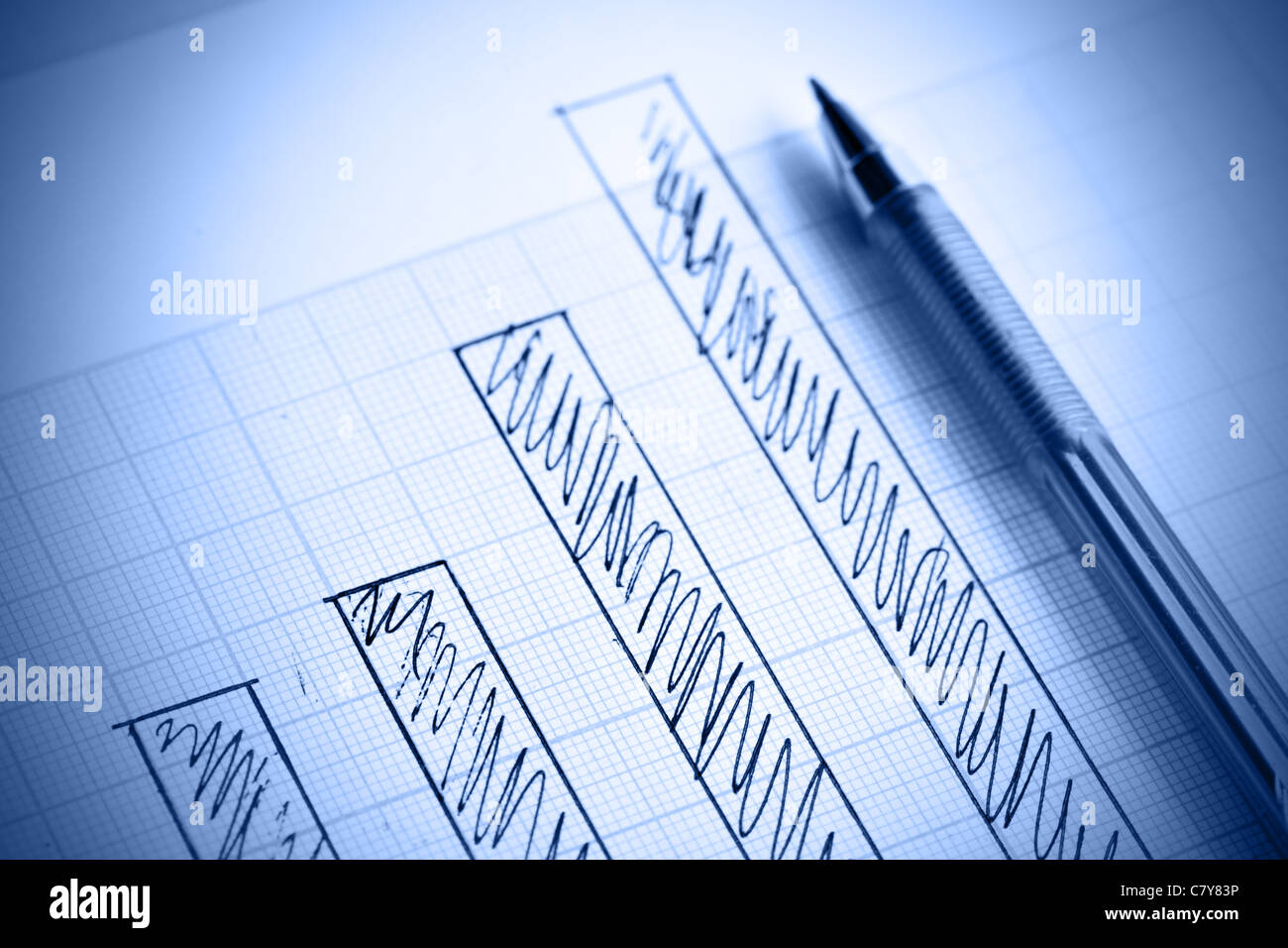 Pen and profit bar chart. Shallow DOF! Stock Photo - Alamy
