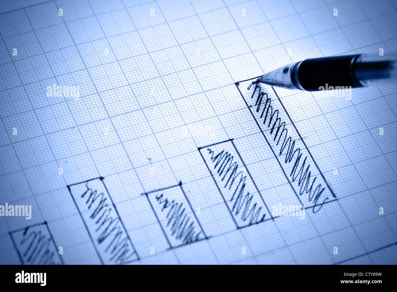 Pen drawing profit bar chart. Shallow DOF! Stock Photo - Alamy