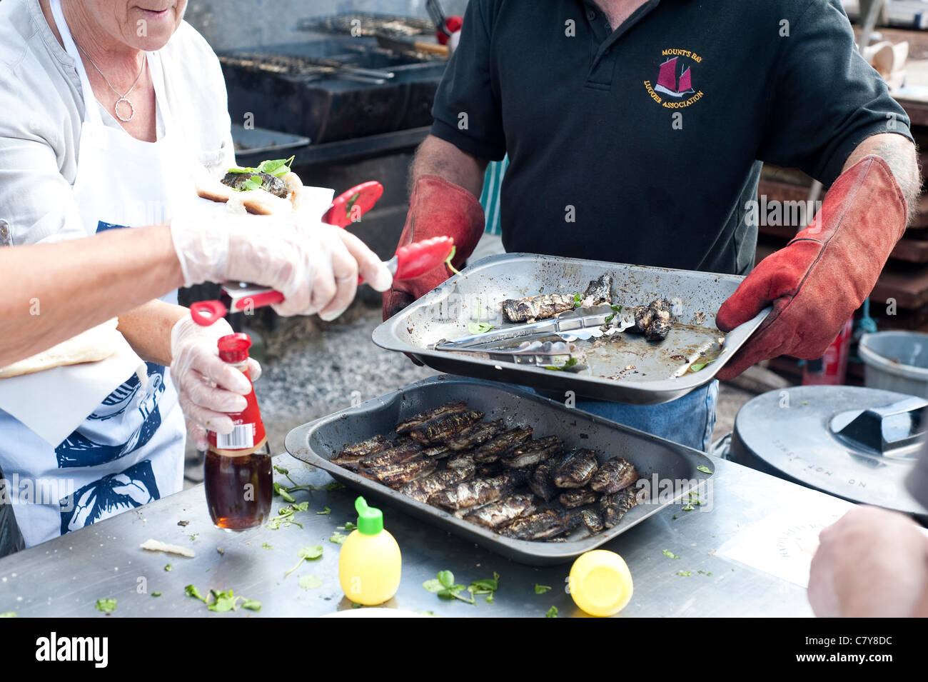 Newlyn, Cornwall, UK - Fish festival, stand selling grilled sardines ...