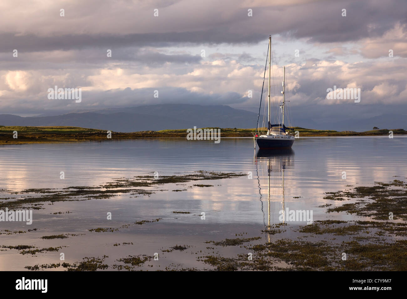 Moored sailing yacht in sea inlet at Lower Breakish on the Isle of Skye ...