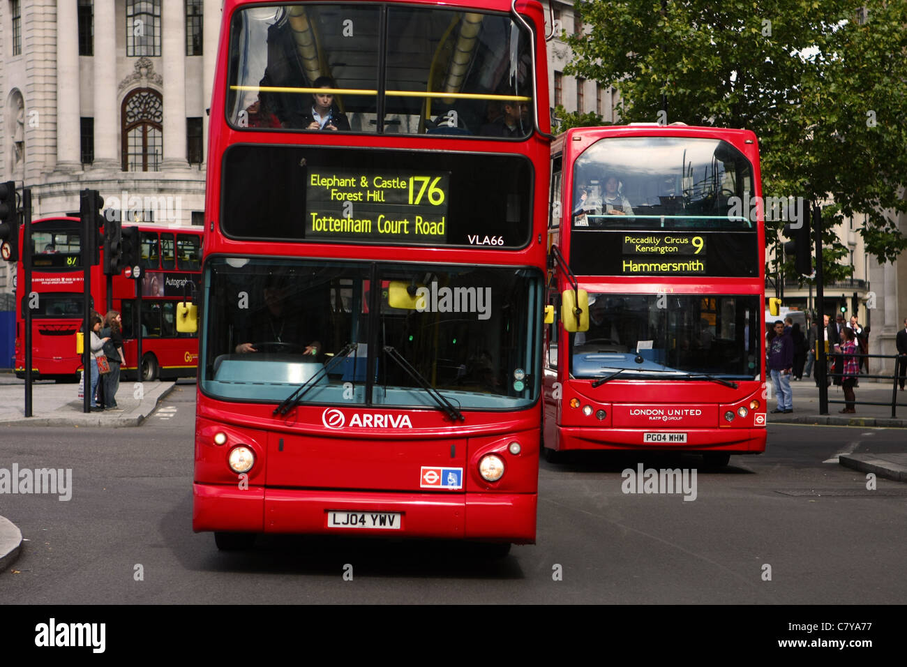 double decker red London buses traveling in London Stock Photo - Alamy