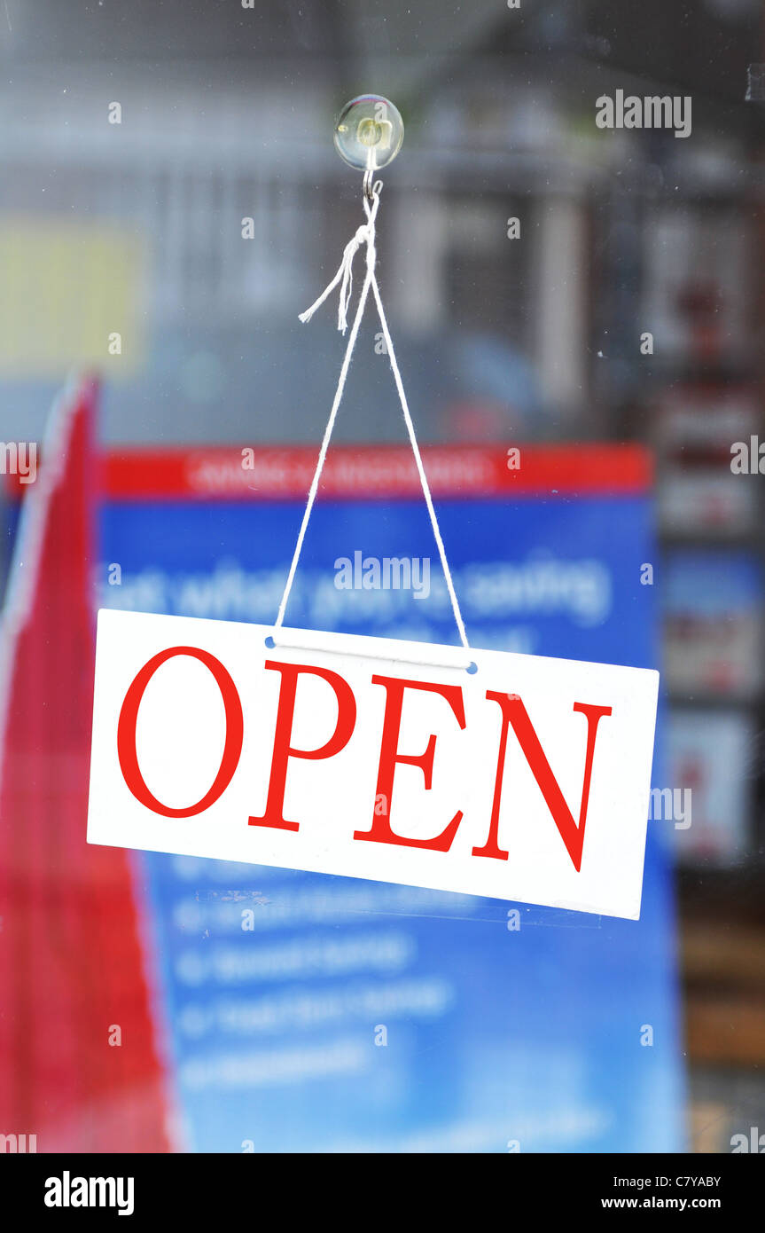 Open sign in shop window Stock Photo - Alamy