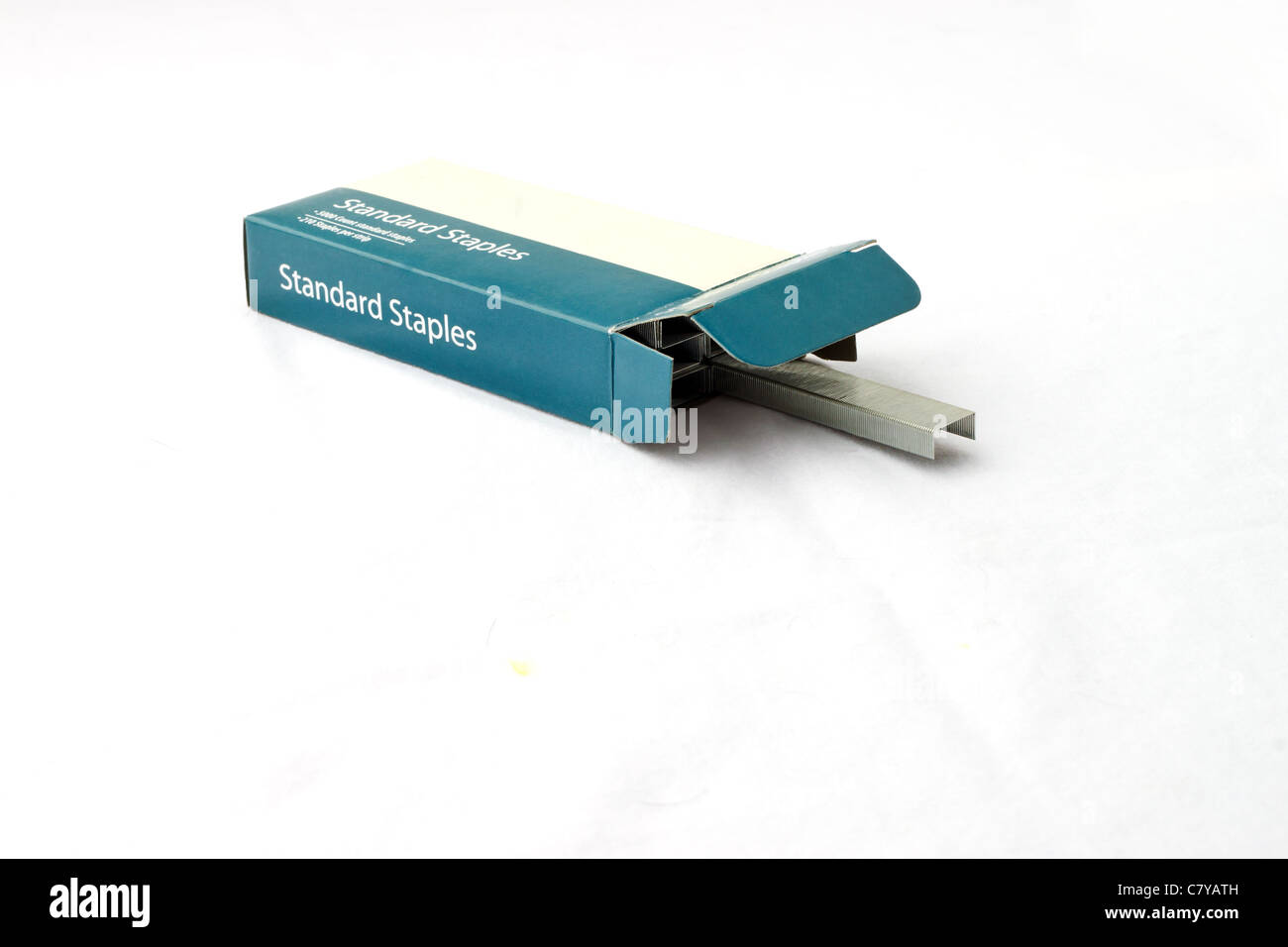 Single strip of staples pulled out of standard staple box Stock Photo ...