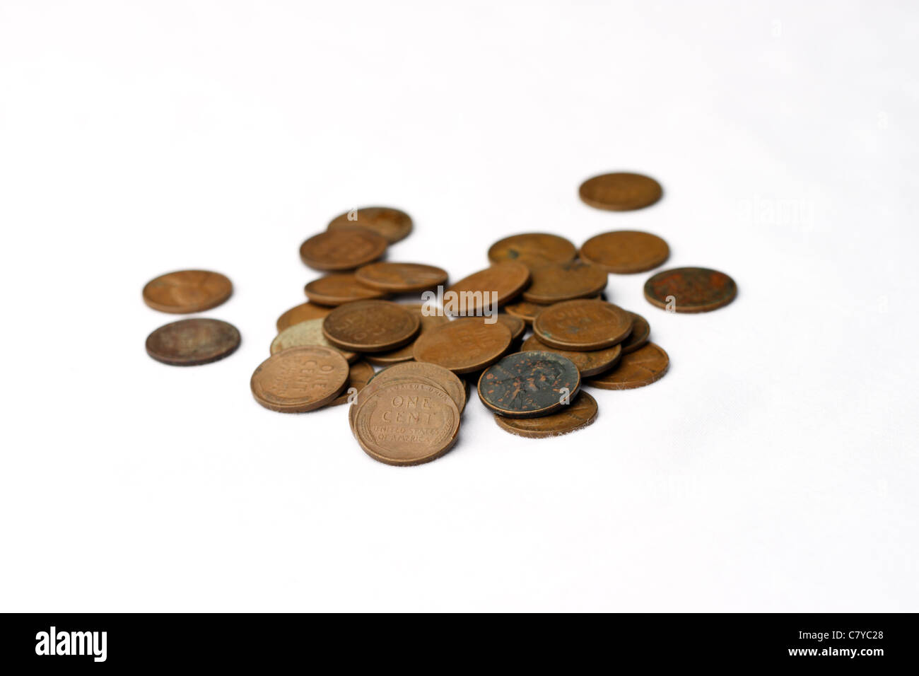 Small pile of wheat pennies on a white surface Stock Photo - Alamy