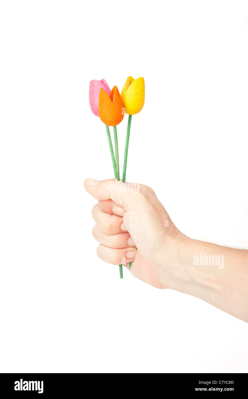 Hand giving flower Cut Out Stock Images & Pictures - Alamy