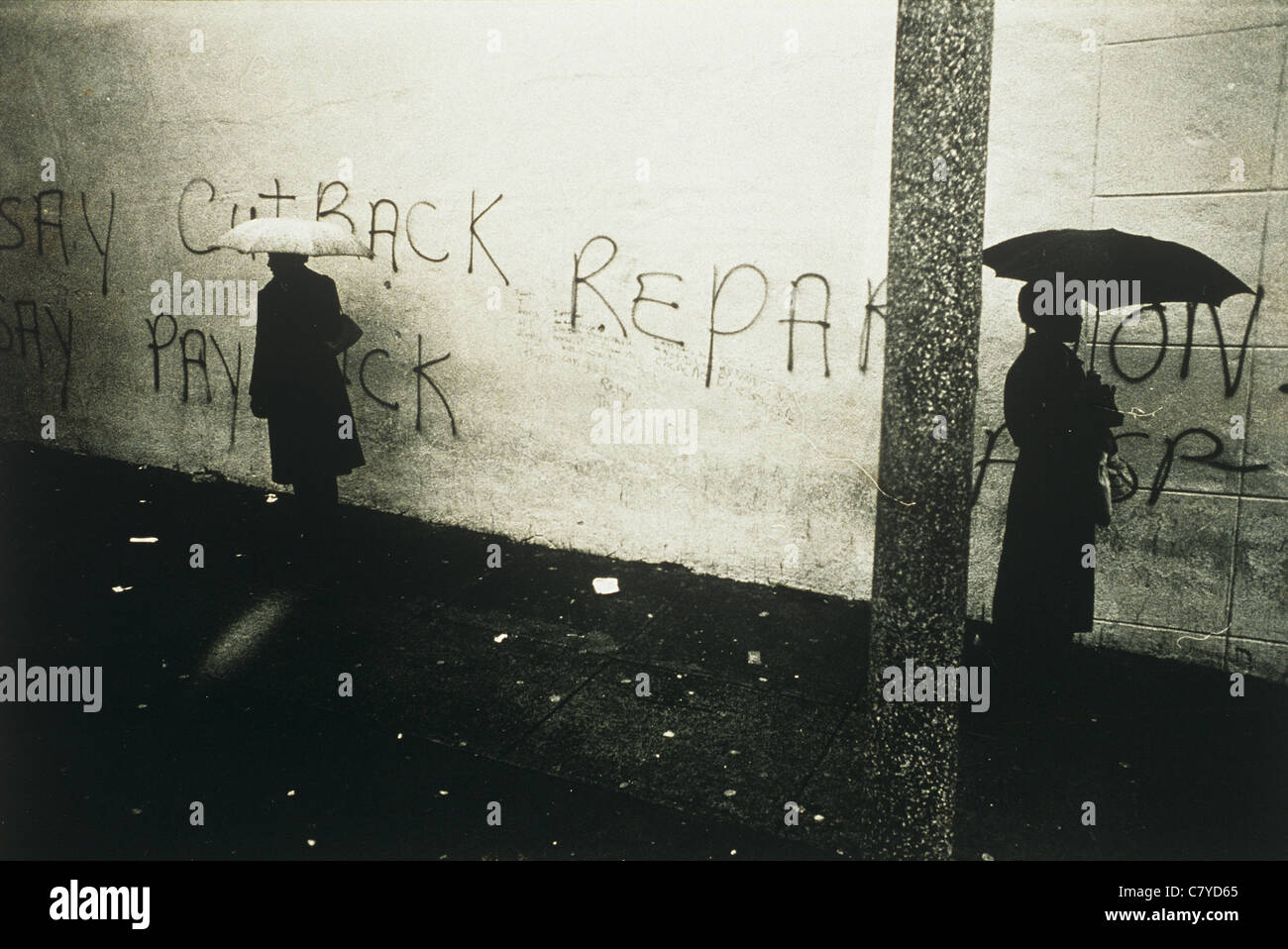 Two people walking opposite directions hi-res stock photography and ...