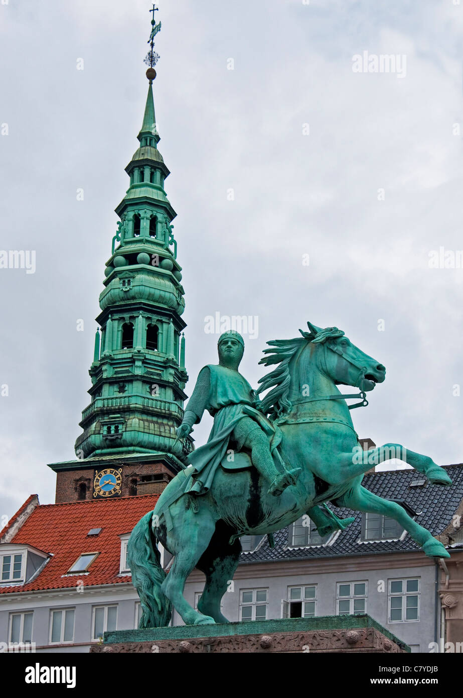 Equestrian statue of Bishop Absalon with St Nicholas Church steeple in ...
