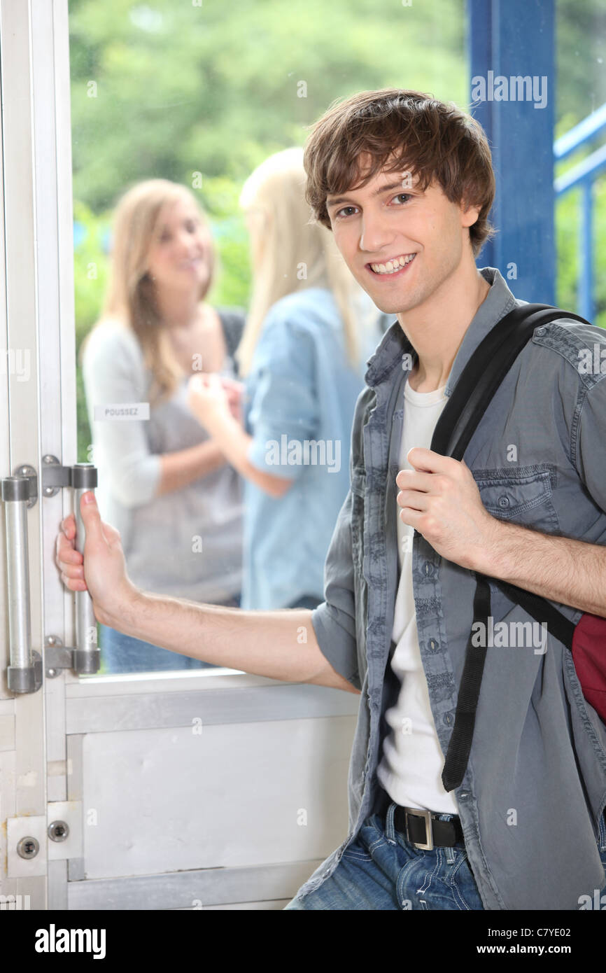 teenage boy leaving high school Stock Photo - Alamy