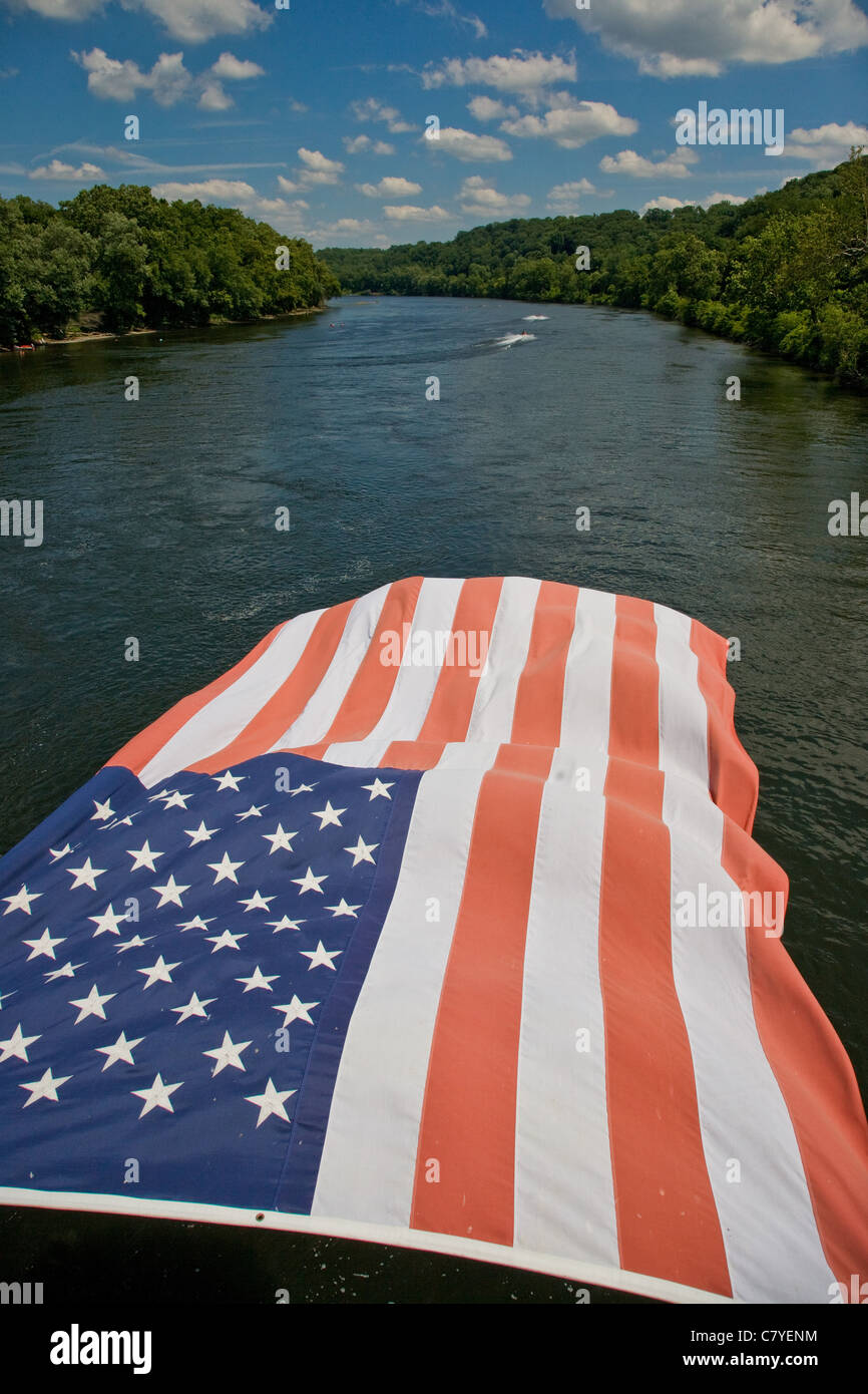 Large American flag hanging from a walking bridge over the Delaware ...