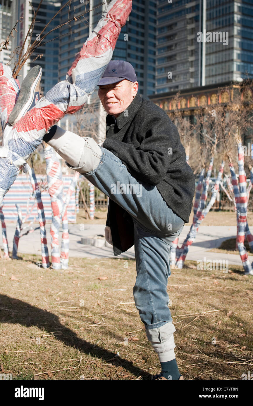 Elderly Chinese man exercising in the park in Dalian, China Stock Photo ...