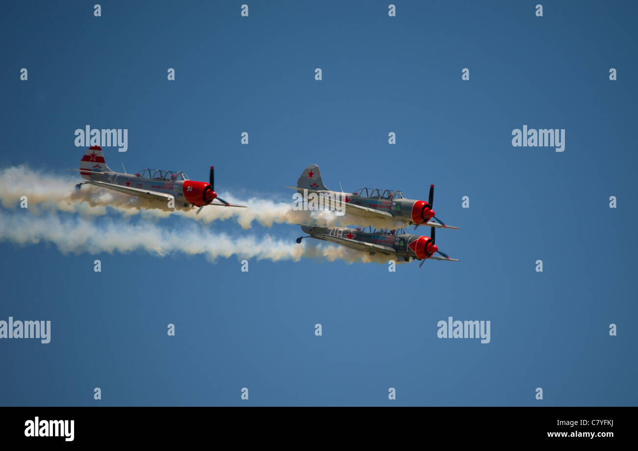 three show planes perform in the air show fest maneuver Stock Photo - Alamy