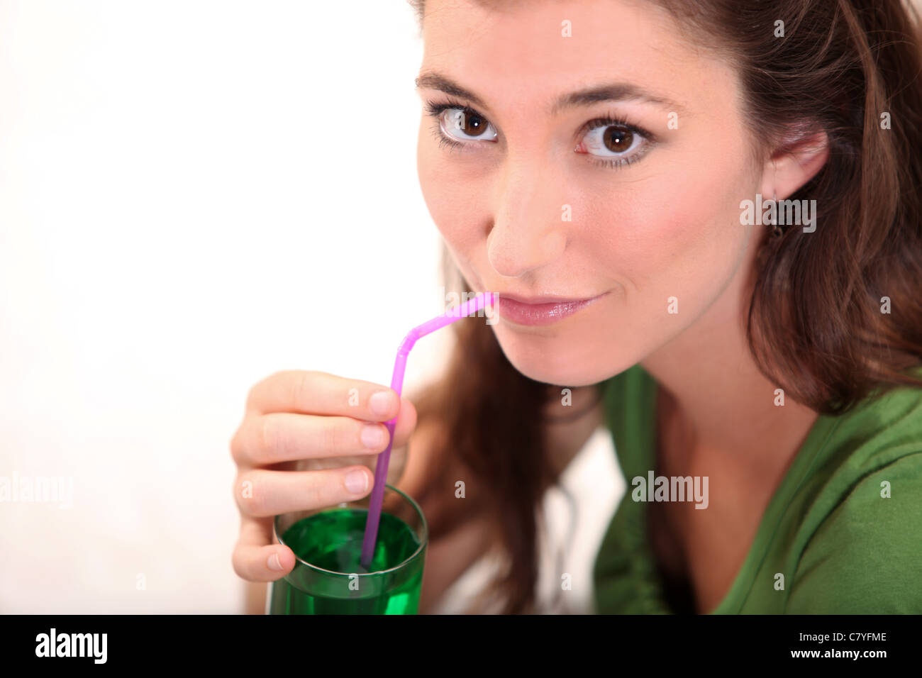 Woman drinking mint squash Stock Photo - Alamy