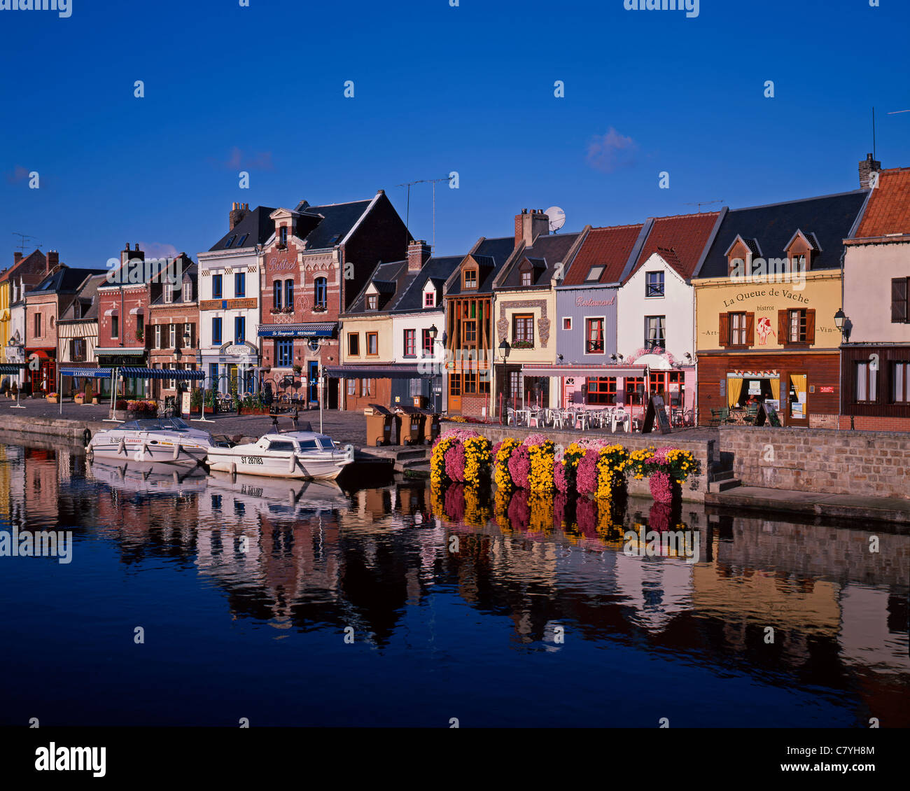 St. Leu, Canal, Raw of houses, Water front, Blue sky, Canal Stock Photo ...