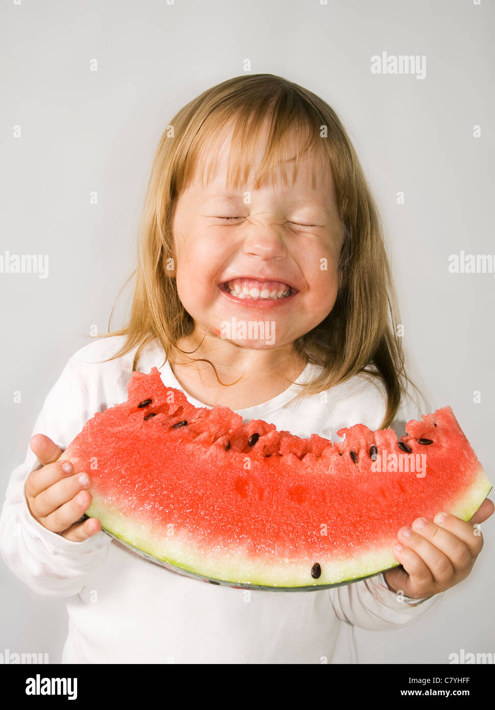 Picture of young girl and a slice of watermelon Stock Photo - Alamy