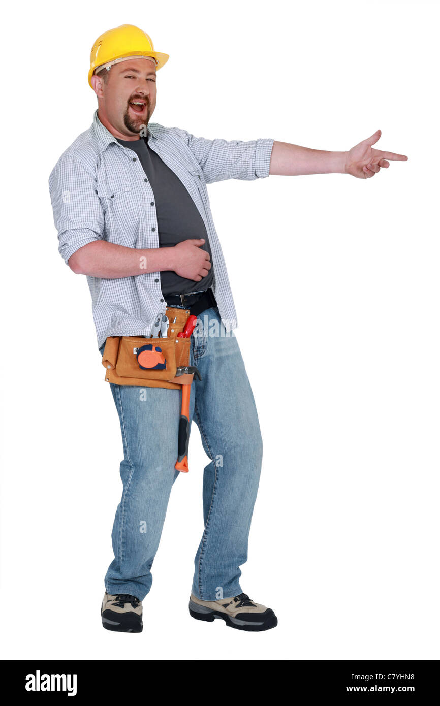 Construction worker laughing at something Stock Photo - Alamy