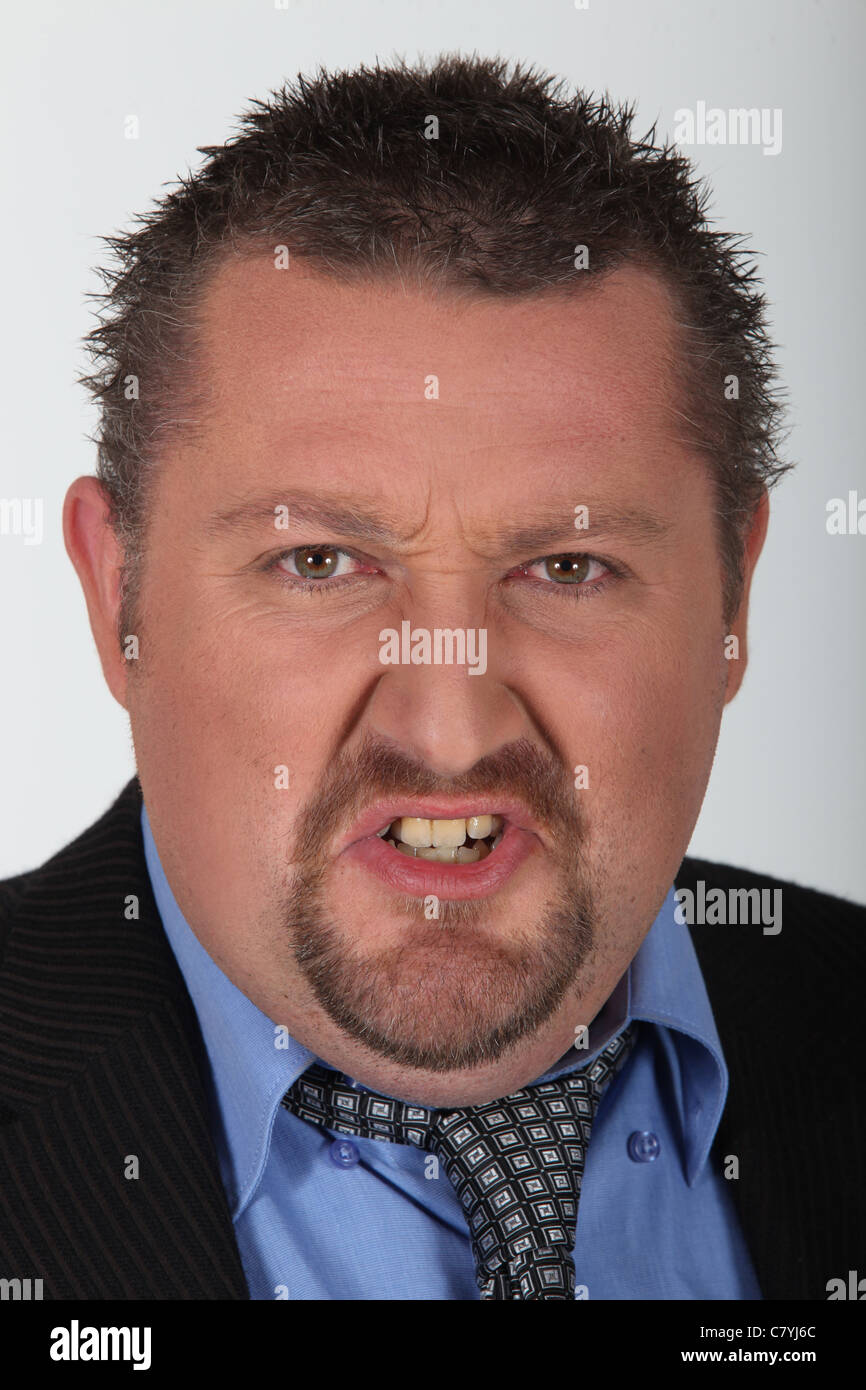 Portrait of angry man Stock Photo - Alamy