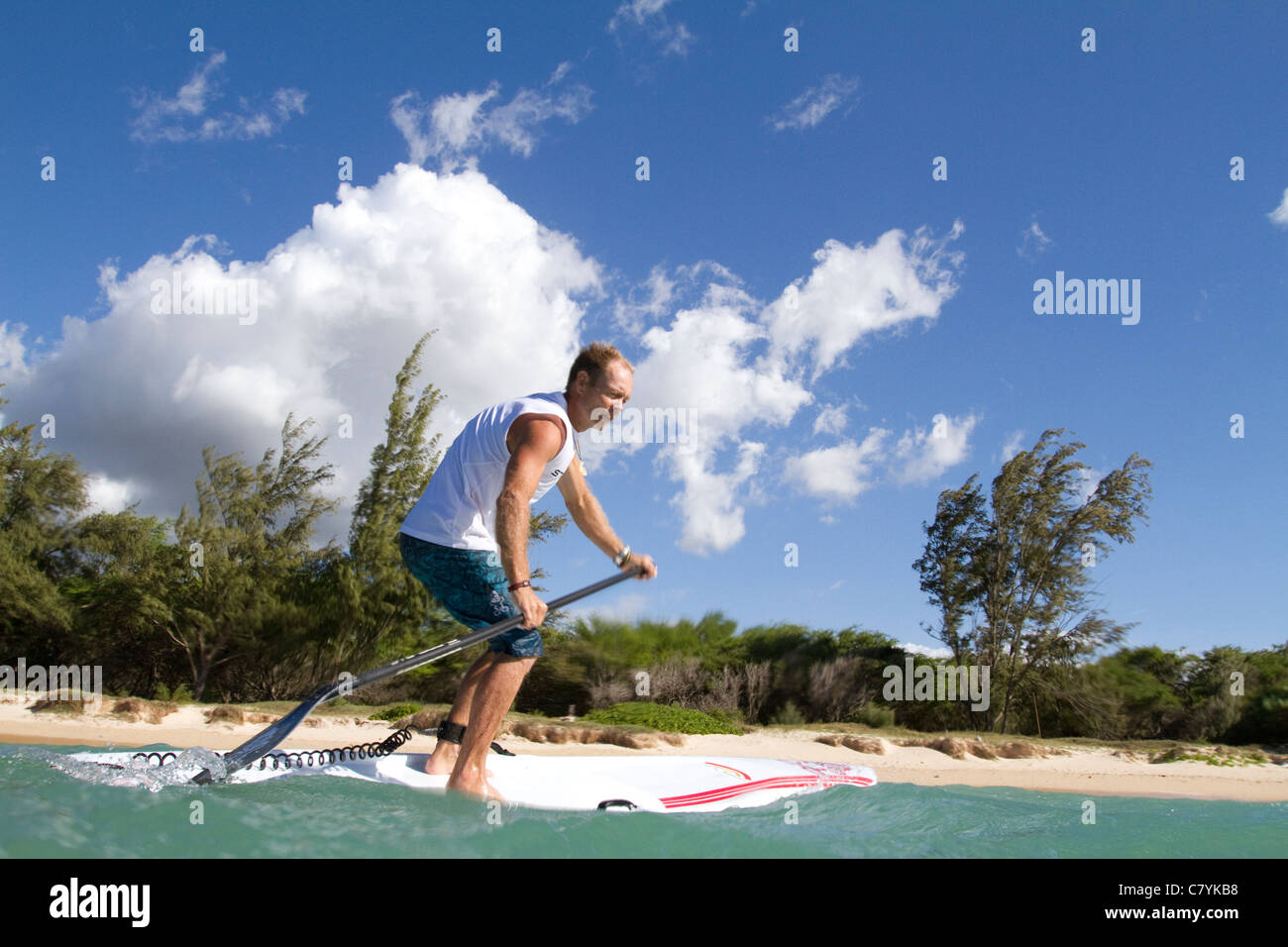Pro stand up paddle board racer Stock Photo - Alamy