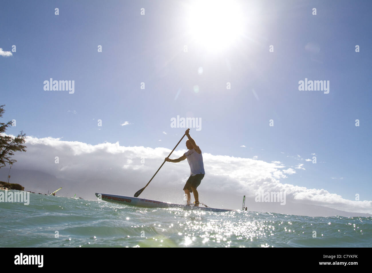 Pro stand up paddle board racer Stock Photo - Alamy